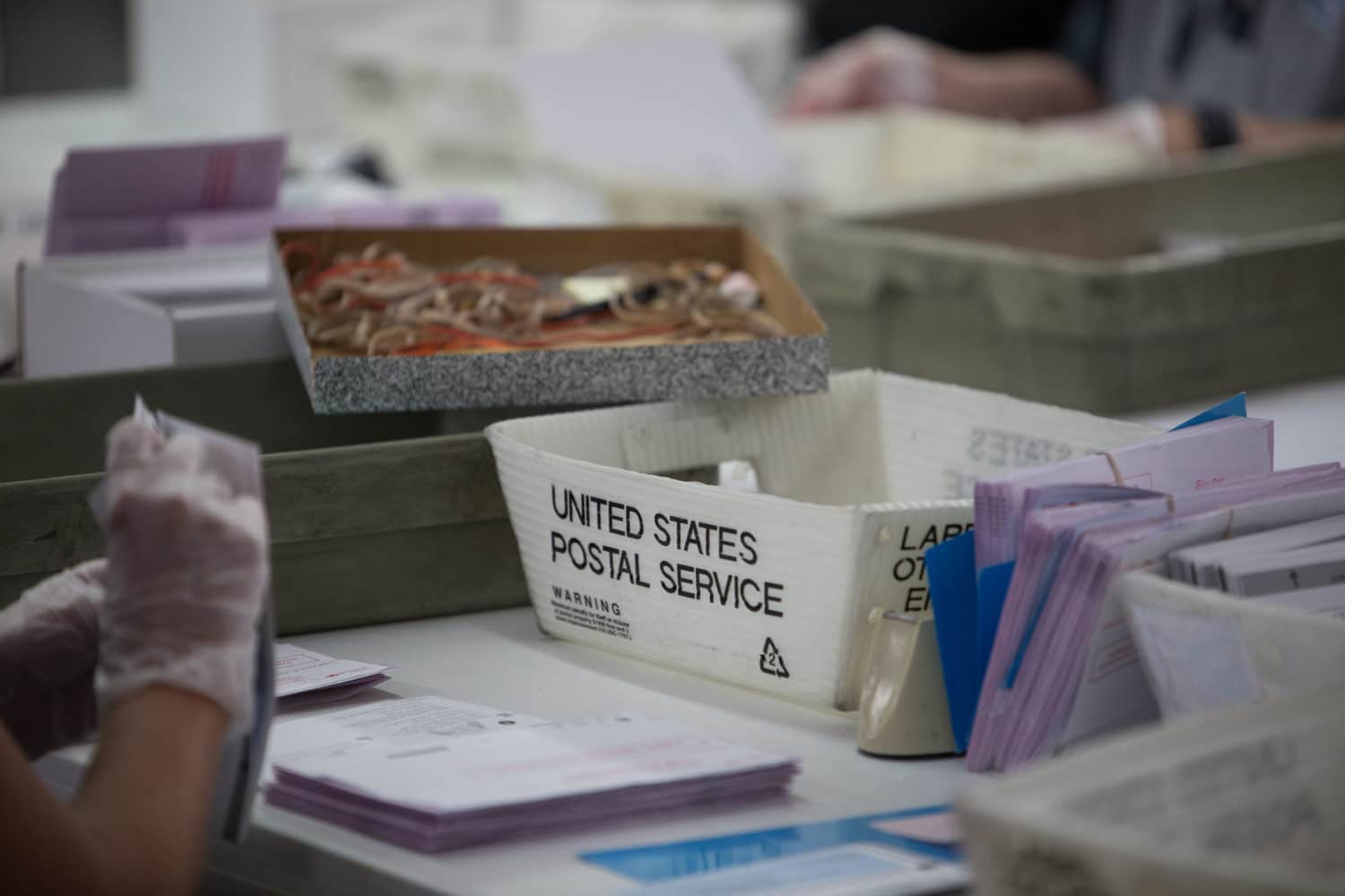 Postal Service Under Fire for Slow Processing of Election Ballots ...